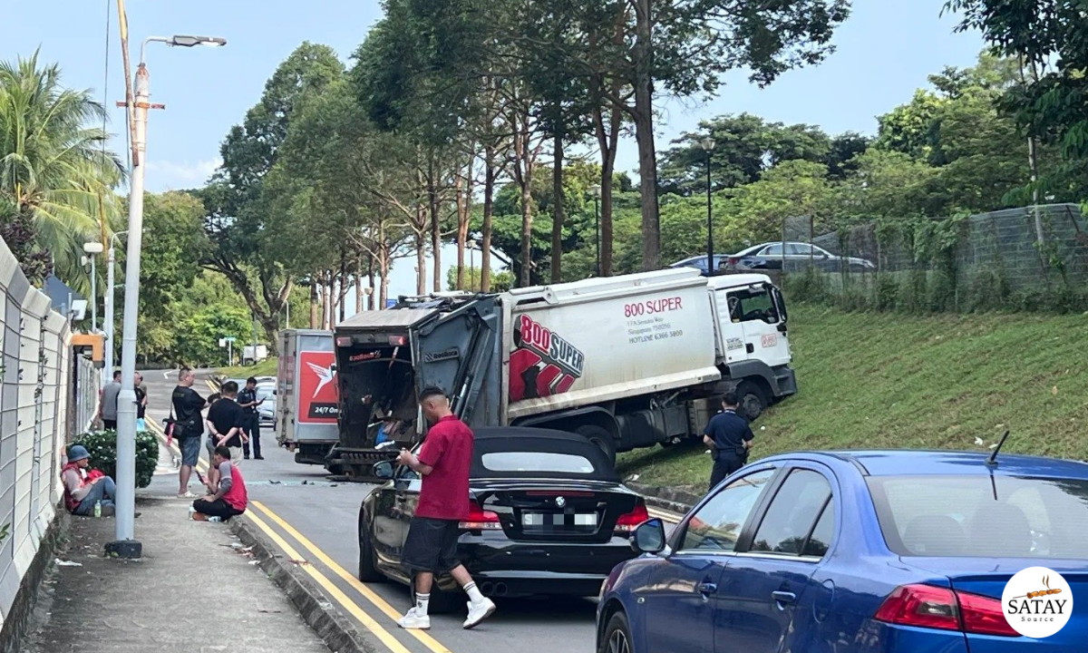 Van Driver Hospitalised After Collision with Waste Truck